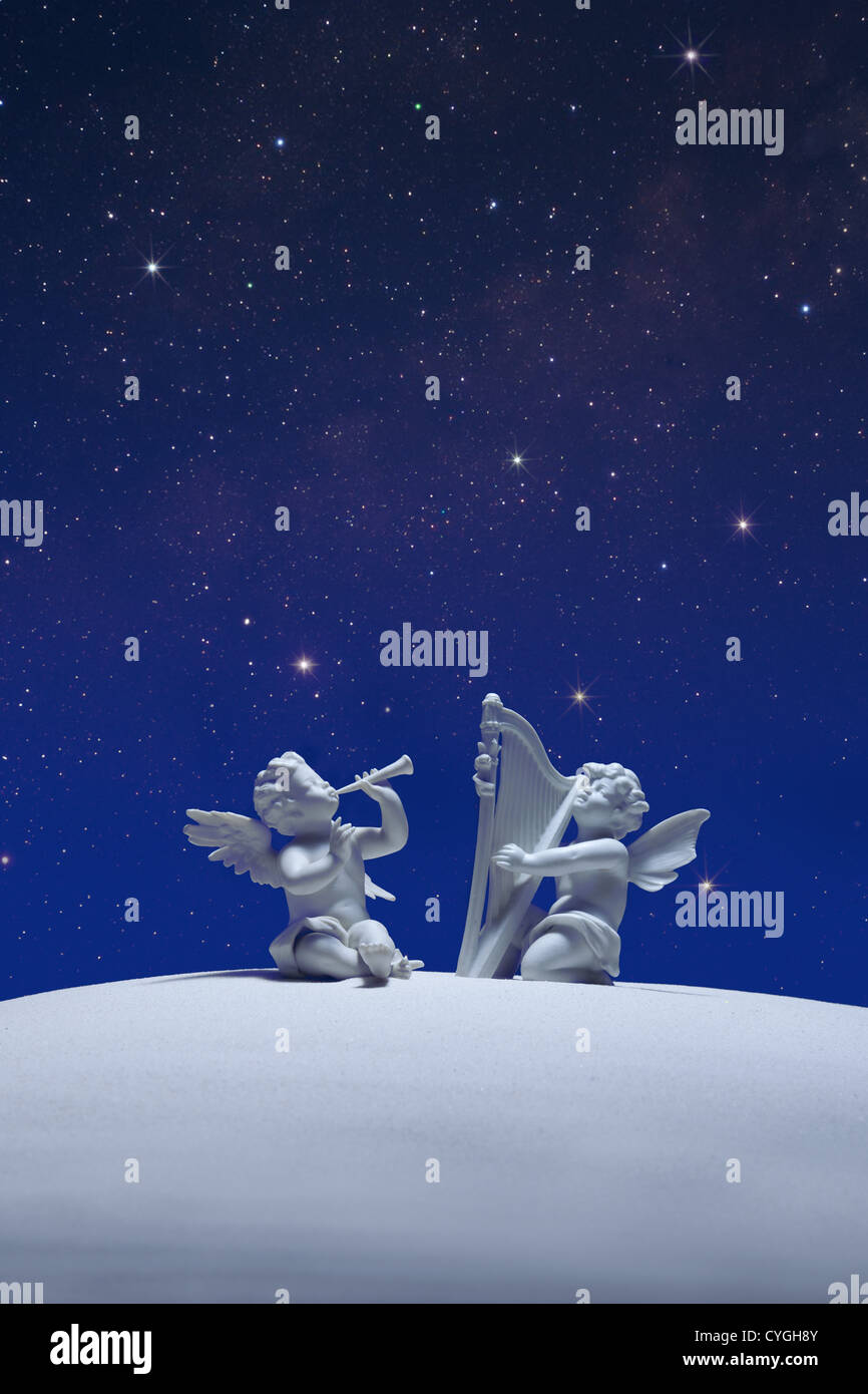 Two angels and stars Stock Photo - Alamy