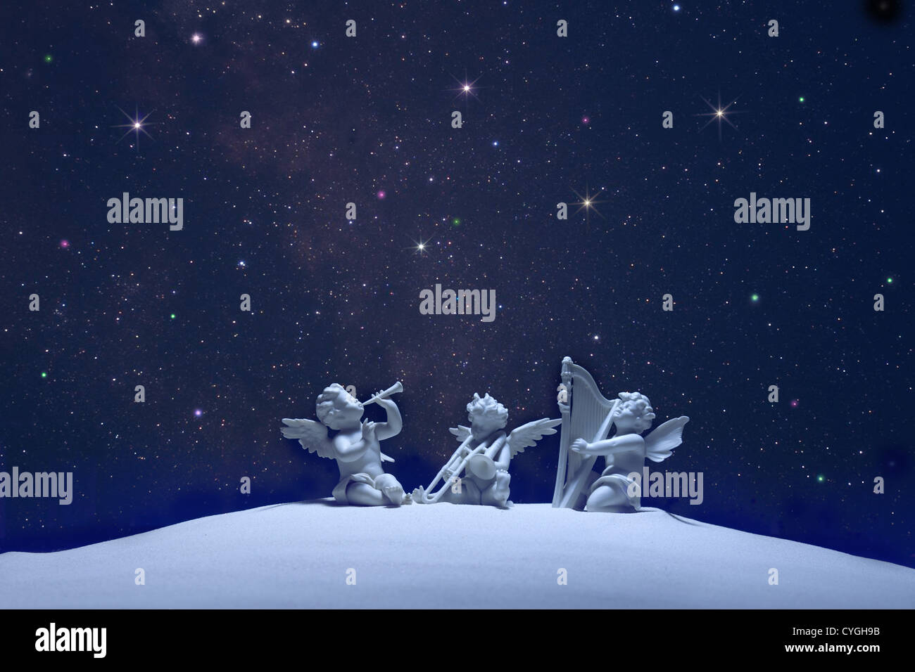 Three angels and stars Stock Photo - Alamy