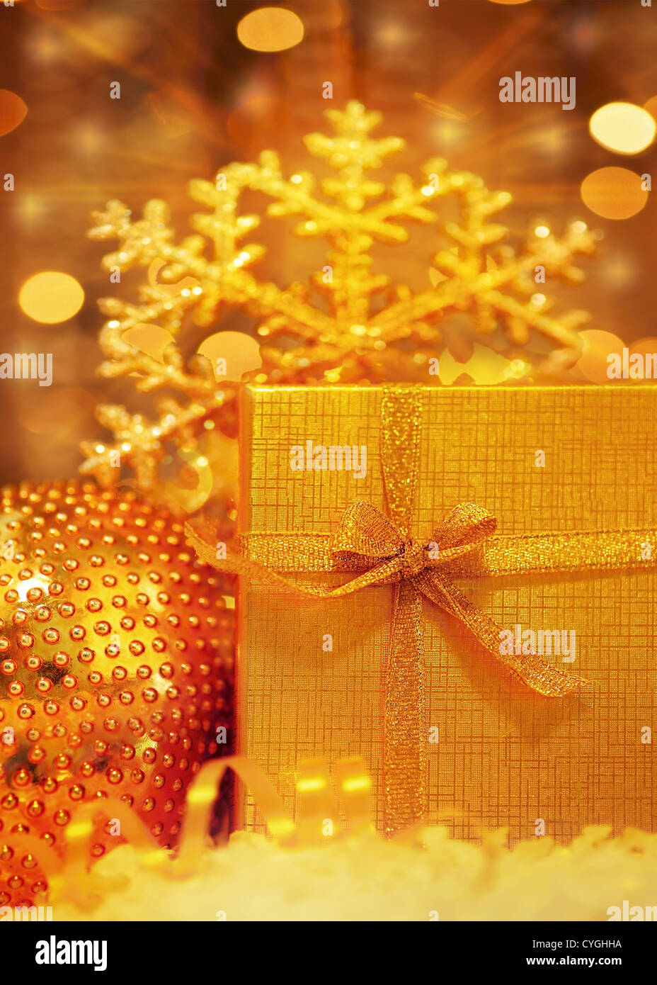 Golden present hi-res stock photography and images - Alamy