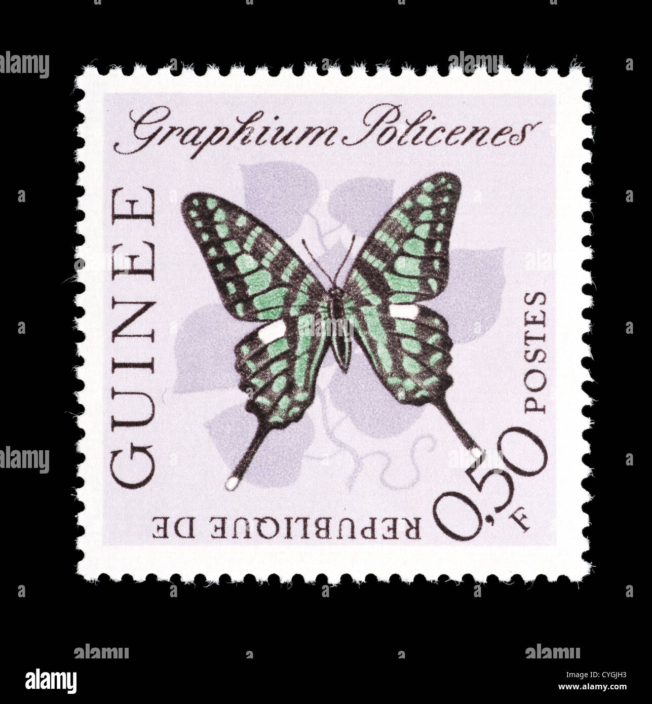 Postage stamp from Guinea depicting a tropical swallowtail butterfly ...