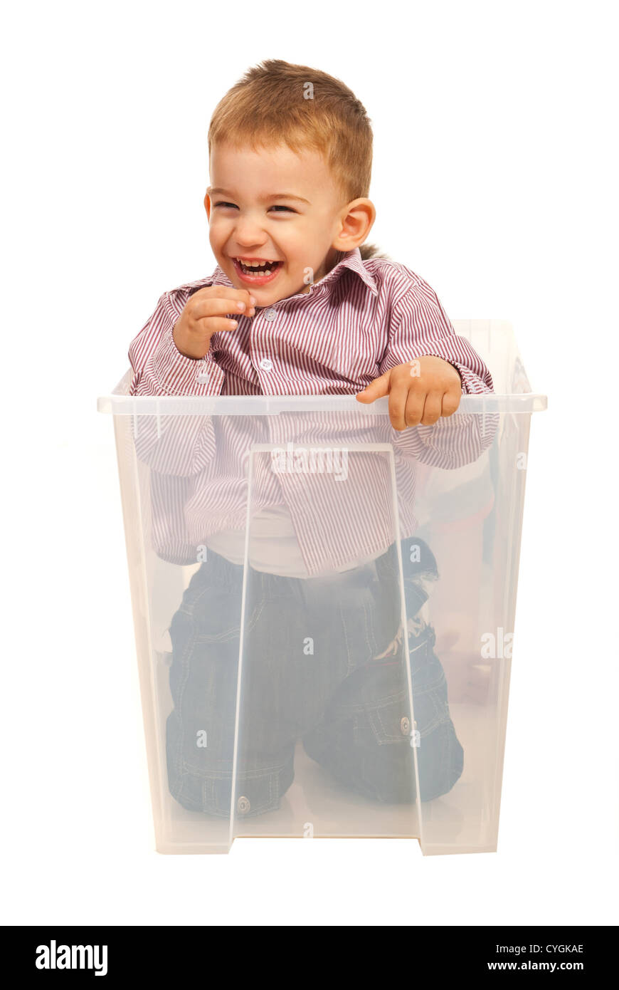 Laughing kid having fun in a transparent box isolated on white ...