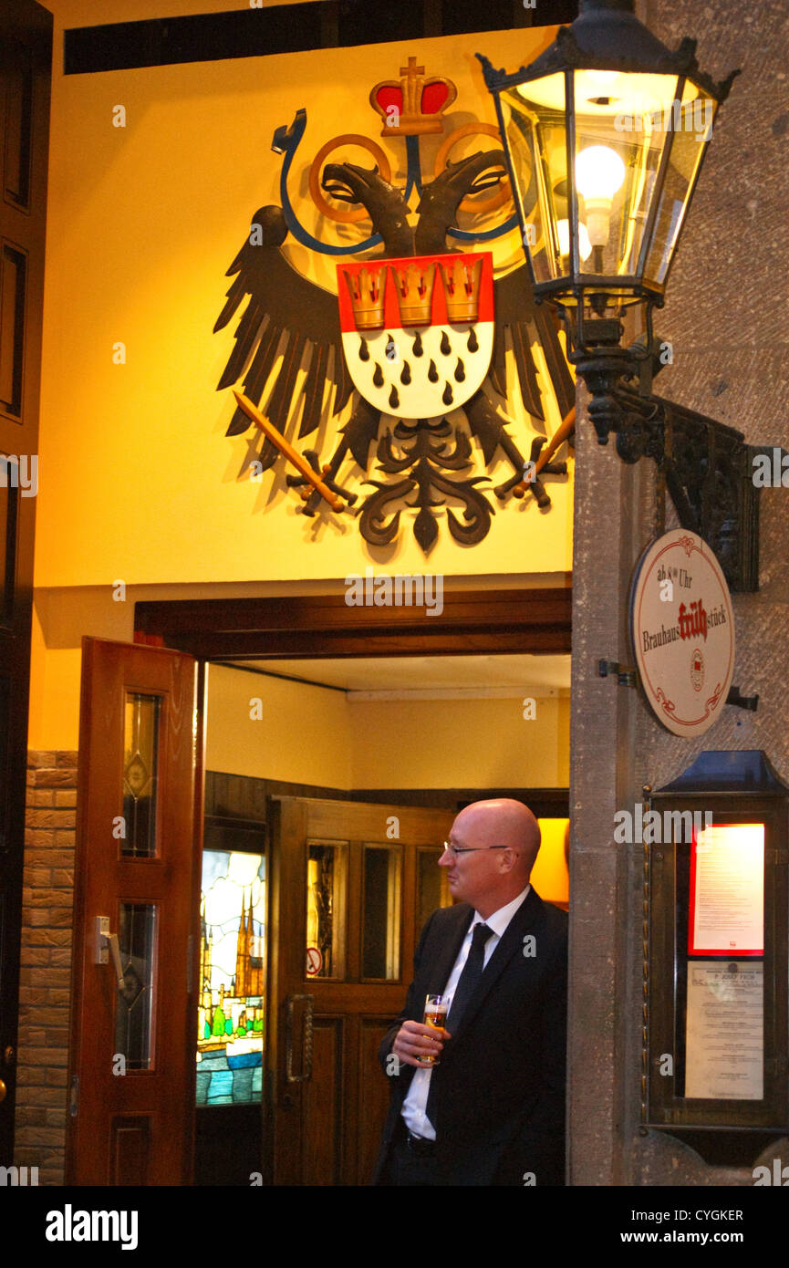 A man drinking Kolsch beer outside the Fruh brewhouse, Cologne, Köln ...