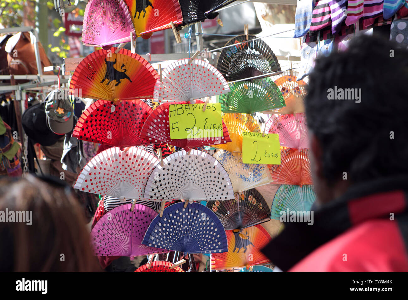People tourists browsing Spanish flamenco style fans for sale, market ...