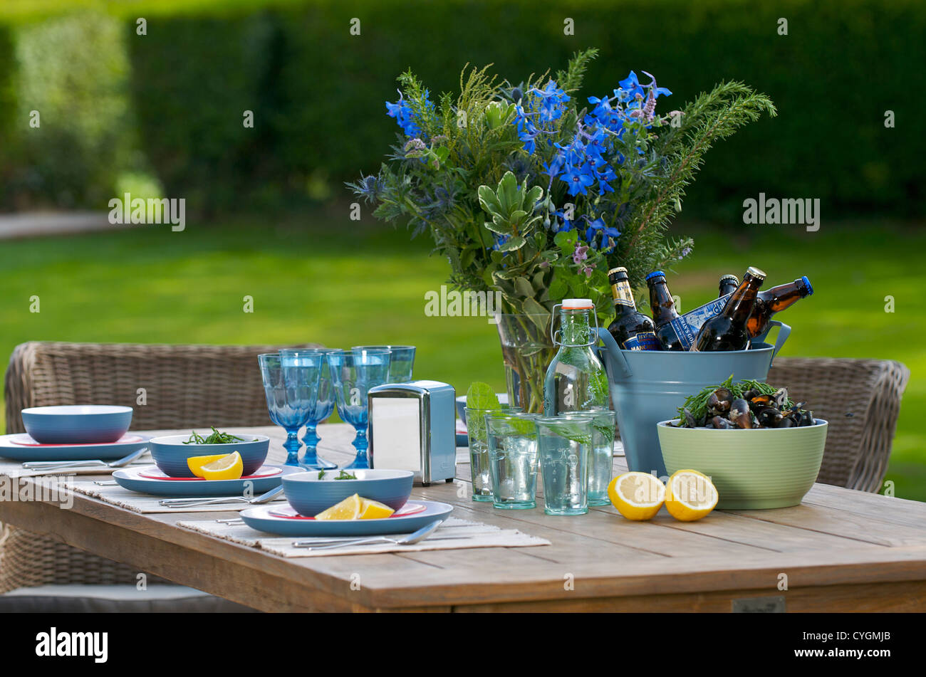 Table laid for outdoor eating Stock Photo - Alamy