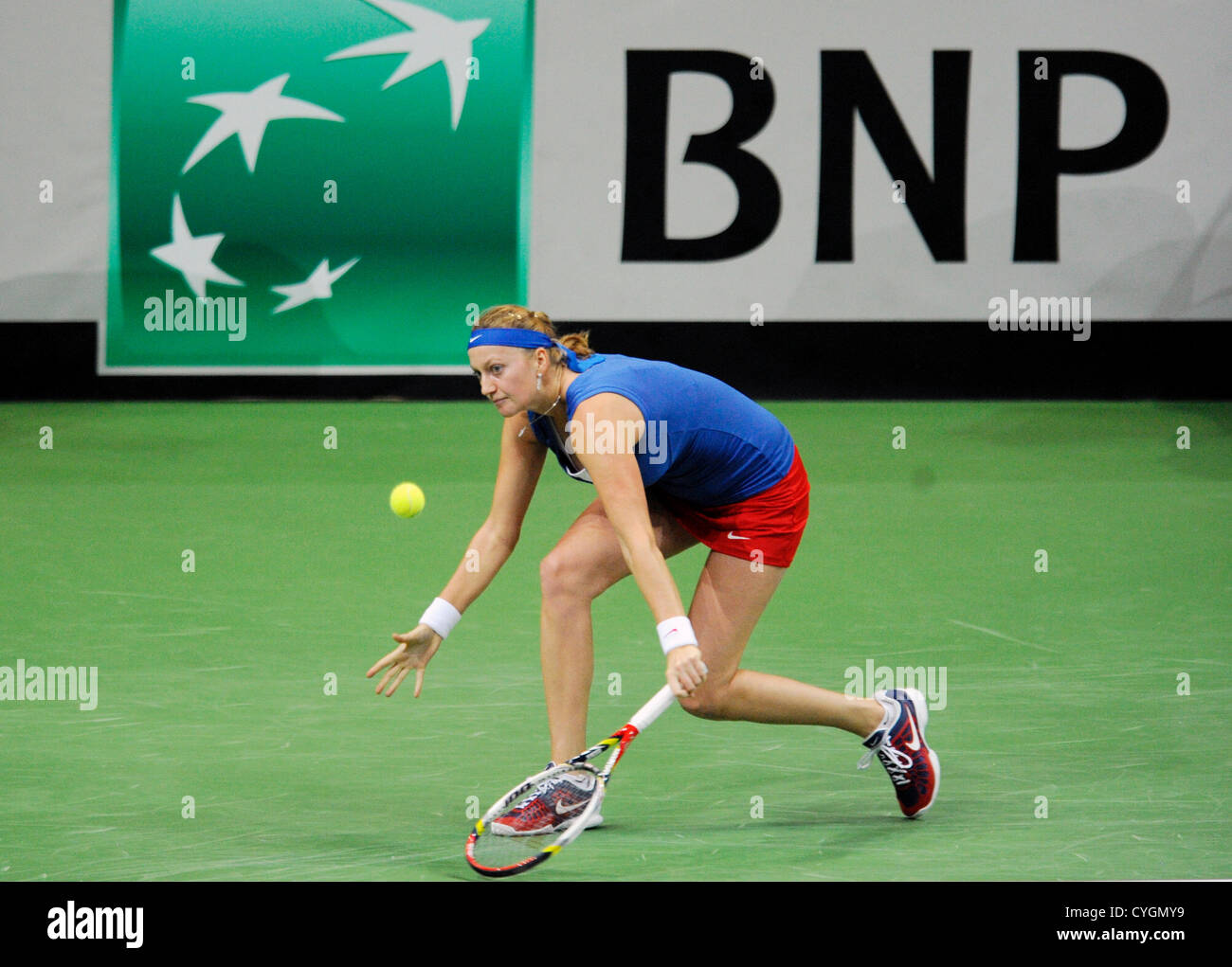 Petra Kvitova of Czech Republic returns a ball to Ana Ivanovic during ...