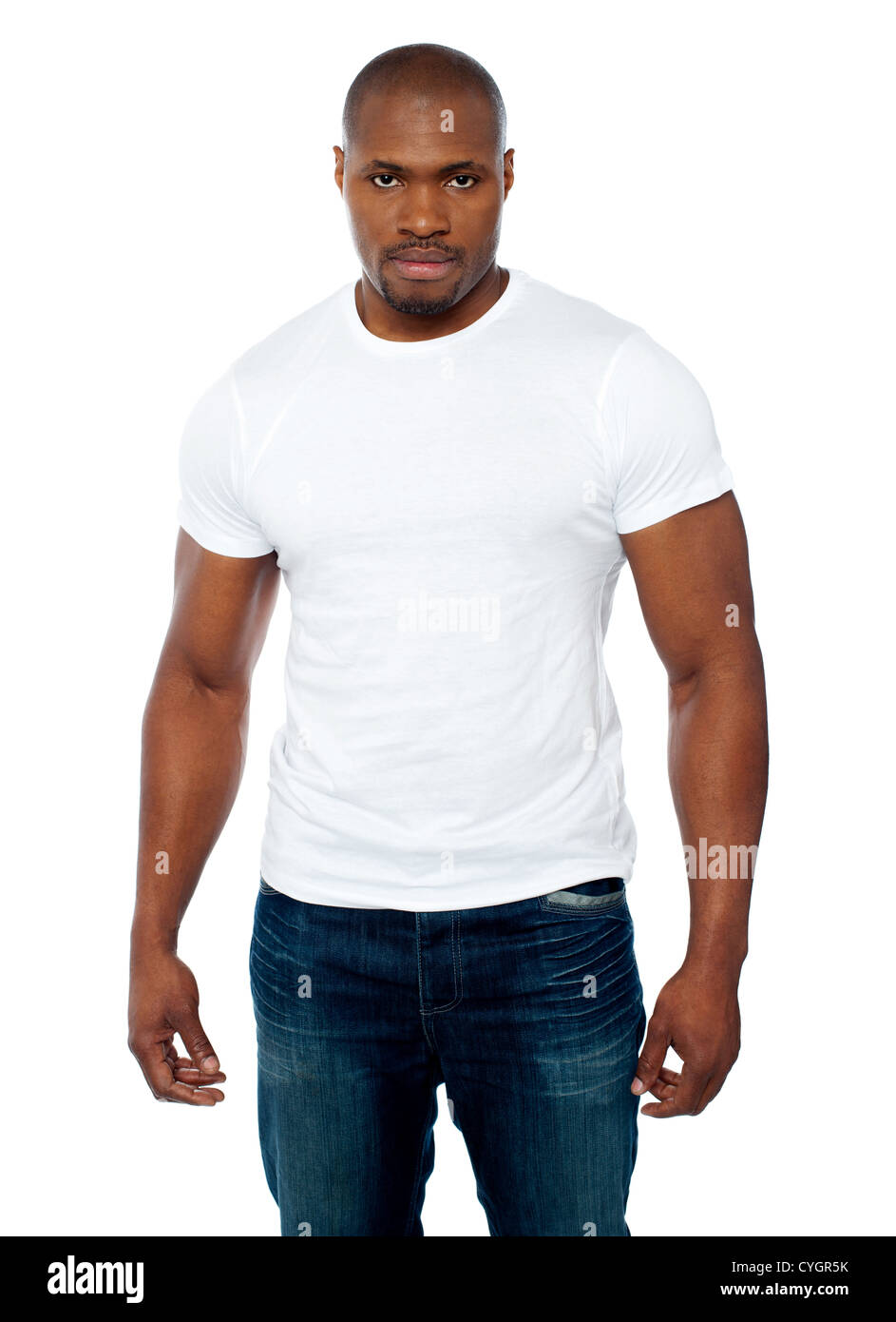 Casual muscular african young man looking right into camera against ...