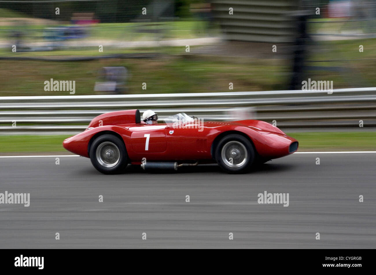 Sir Stirling Moss racing a classic OSCA racing car at Brands Hatch in ...