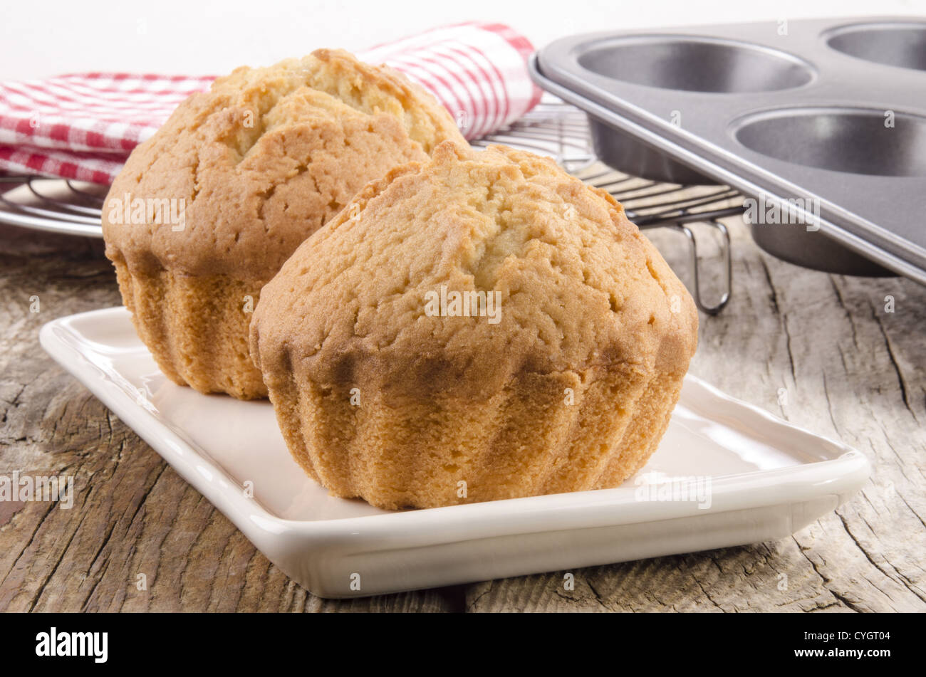 freshly baked muffins on cream colored plate Stock Photo - Alamy