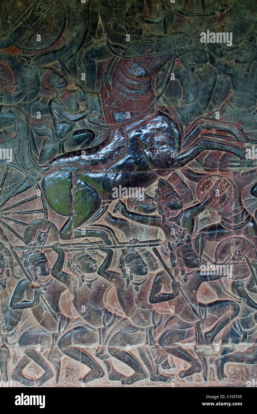 Stone carvings of horse drawn warriors, Angkor Wat, Cambodia Stock ...