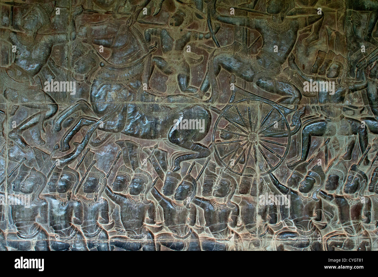 Stone carvings of horse drawn warriors, Angkor Wat, Cambodia Stock ...