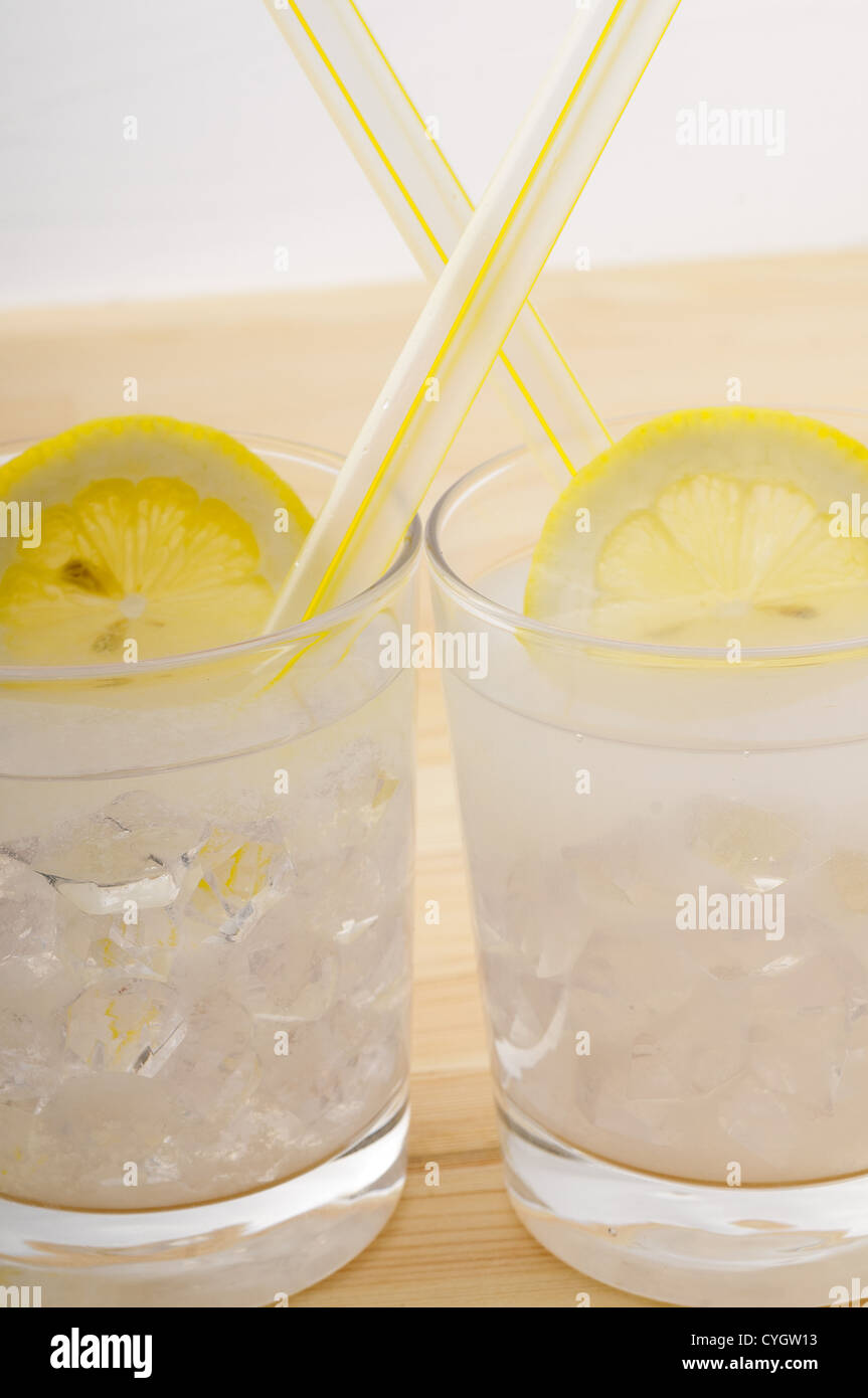 fresh lemonade drink with lemon slice closeup Stock Photo - Alamy