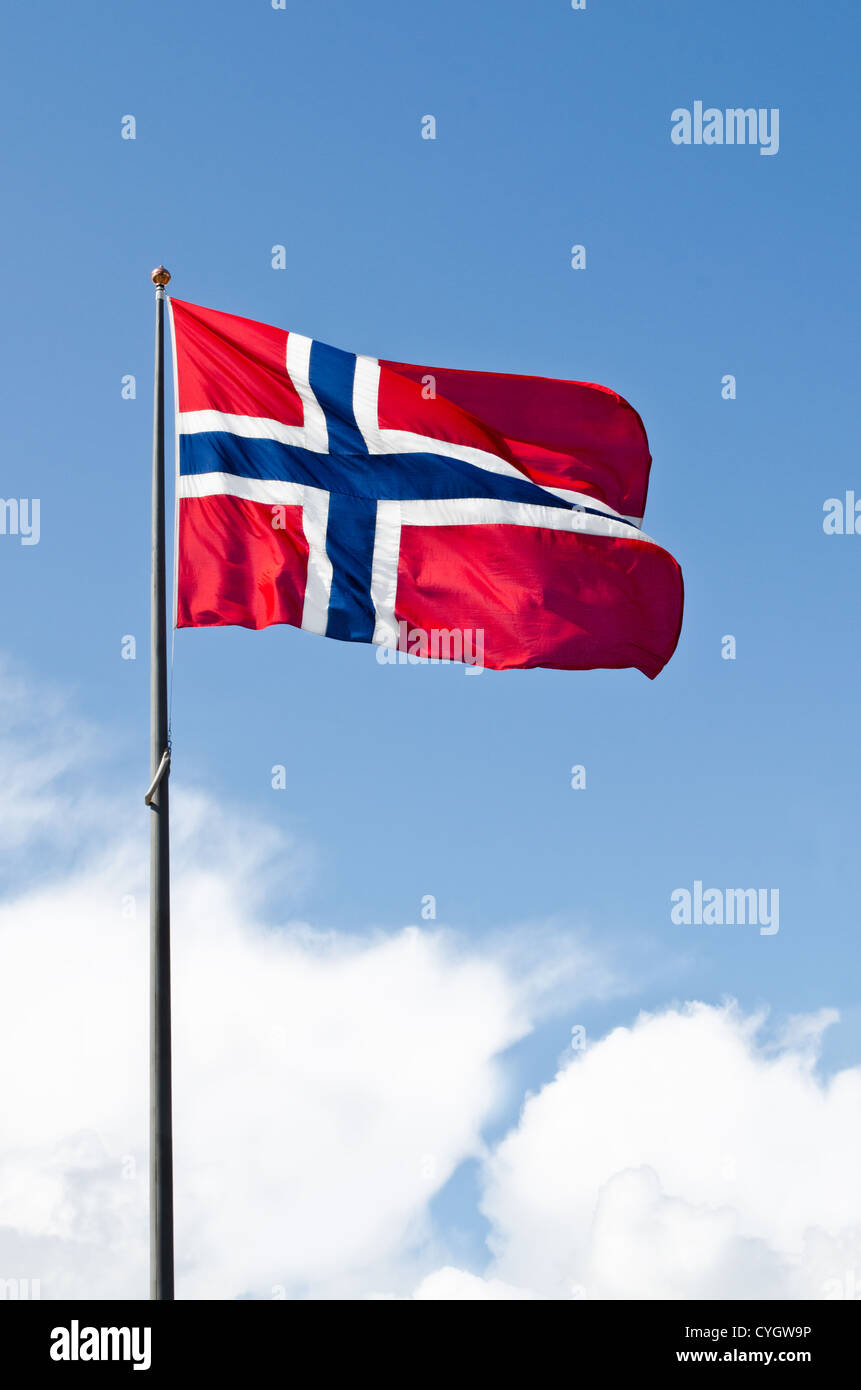 Norwegian flag on blue sky Stock Photo - Alamy