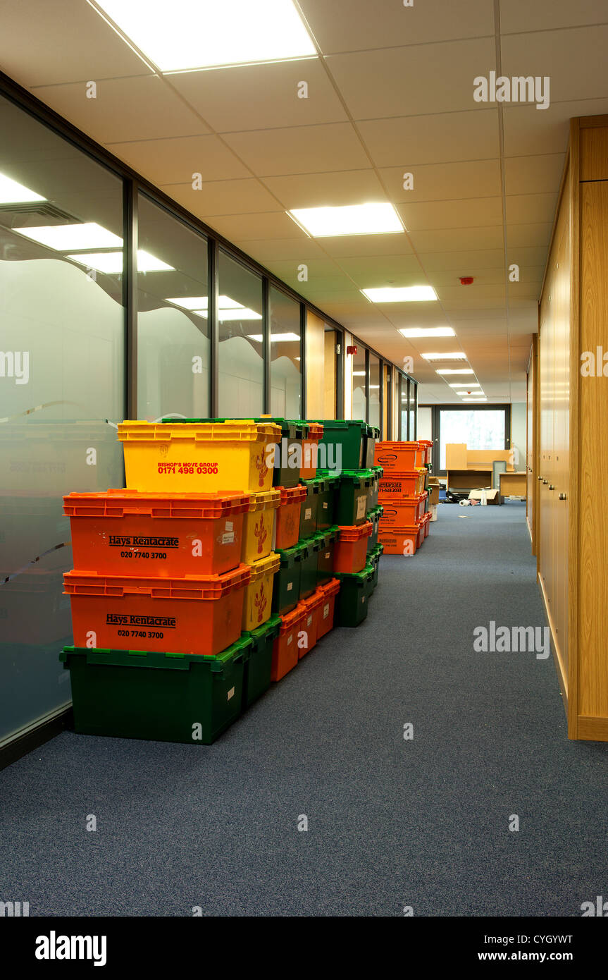 Plastic Boxes Stacked in Corridor Stock Photo - Alamy