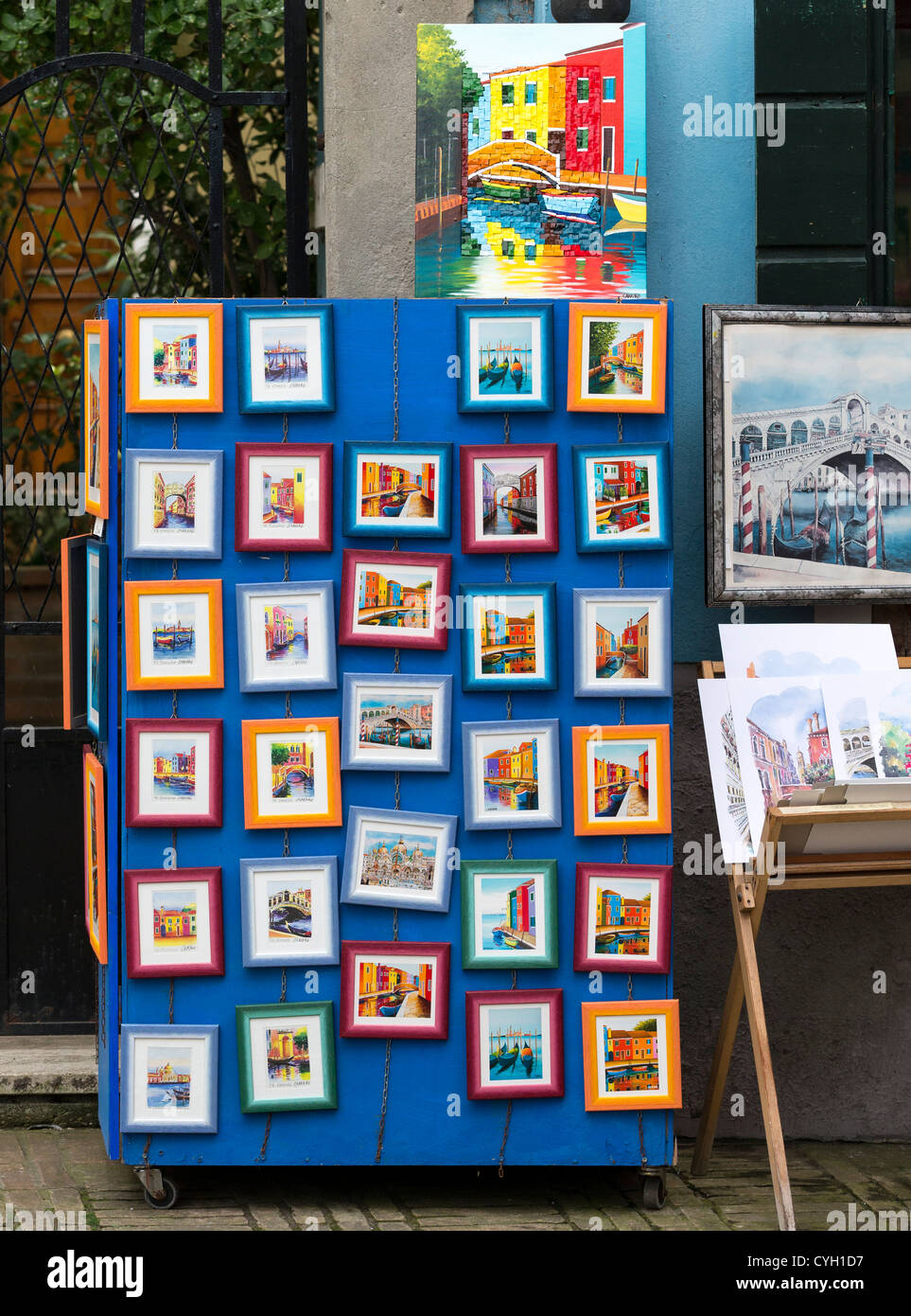 A market stall selling brightly-coloured miniature paintings depicting ...