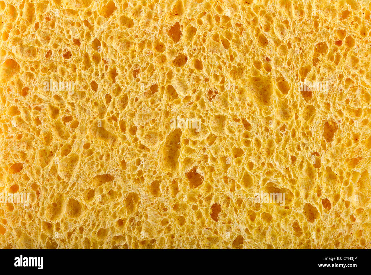 Yellow sponge texture Stock Photo - Alamy