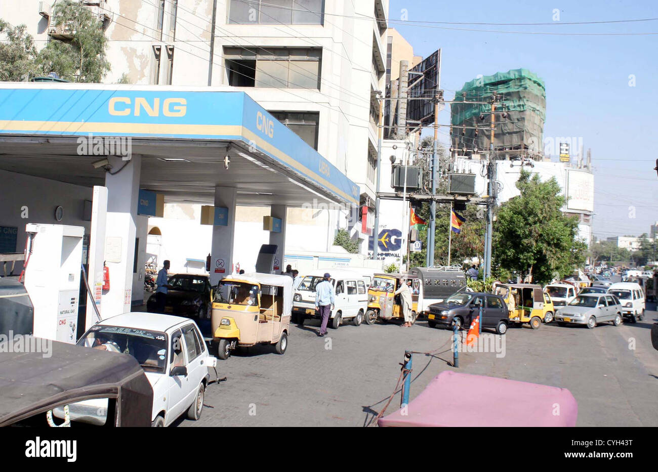 Queue at gas station hi-res stock photography and images - Alamy