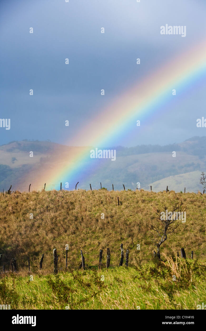 Part of a colorful rainbow in a prairie Stock Photo - Alamy