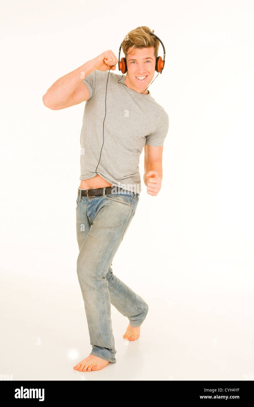 young man with headphones dancing Stock Photo - Alamy