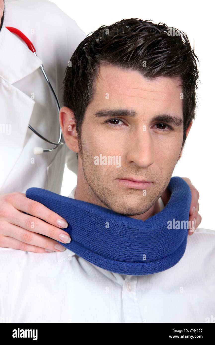 Woman putting minerva to man Stock Photo - Alamy