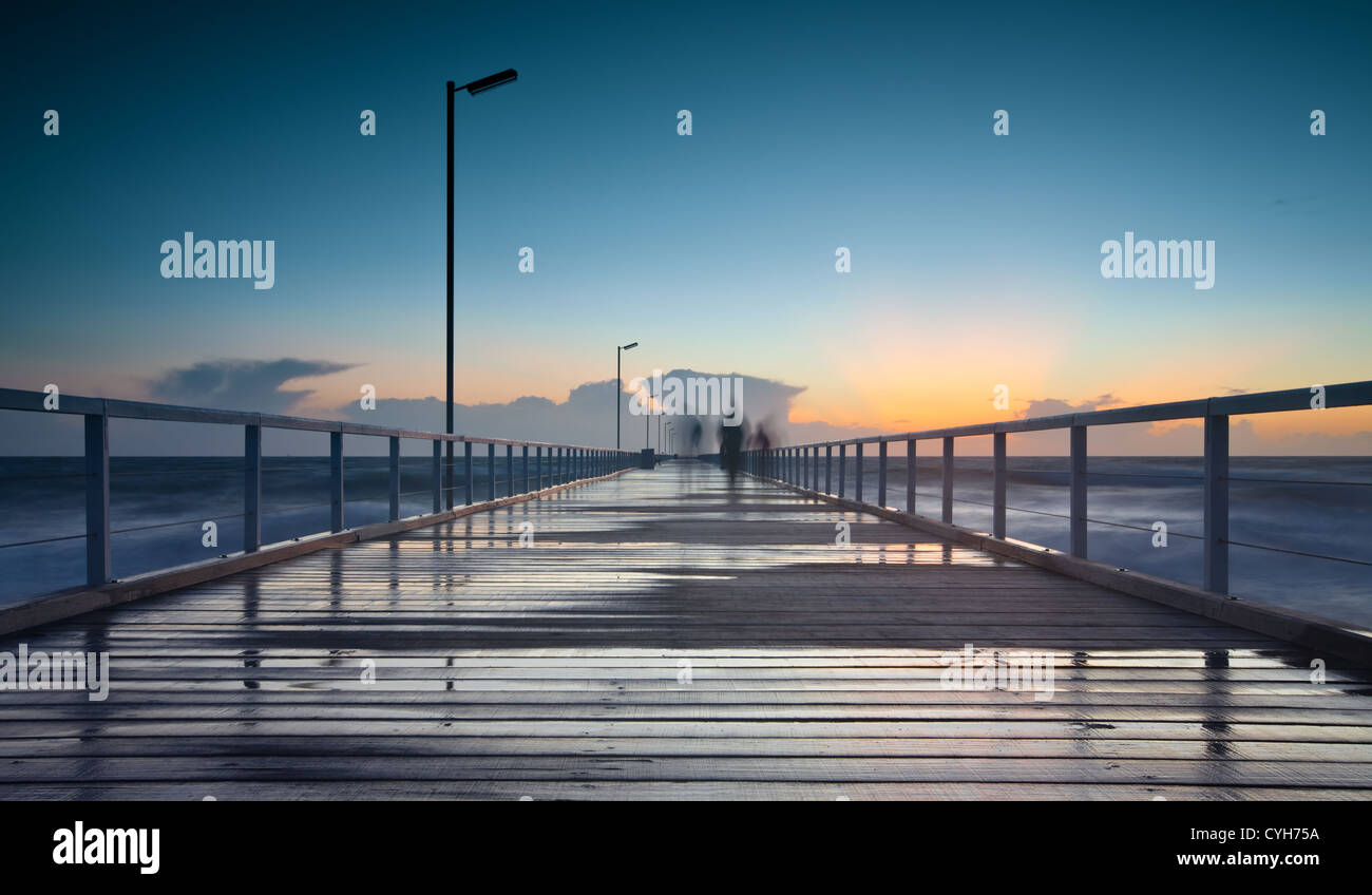 Long Jetty stretching into the sunset Stock Photo - Alamy