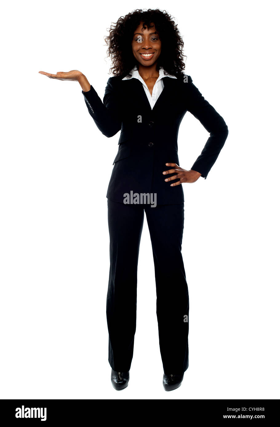 Full length pose of young female ceo presenting copyspace in business ...