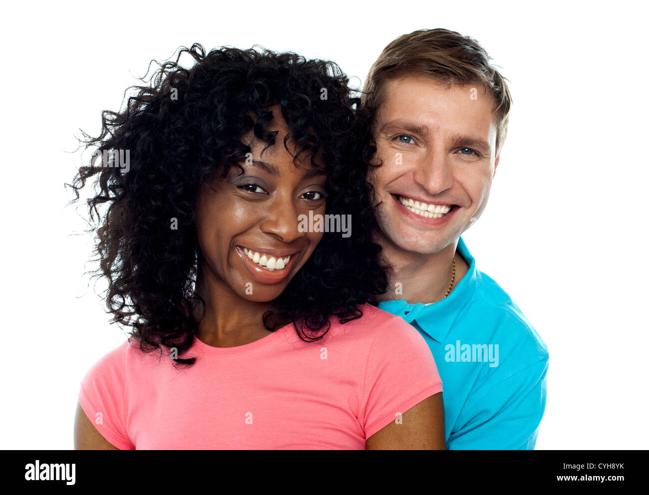 Couple smiling with joy and looking at camera. Hugging in love Stock ...