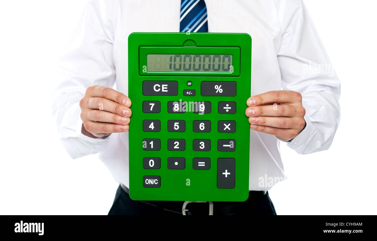 Closeup of a green calculator. Man holding with his hands Stock Photo ...