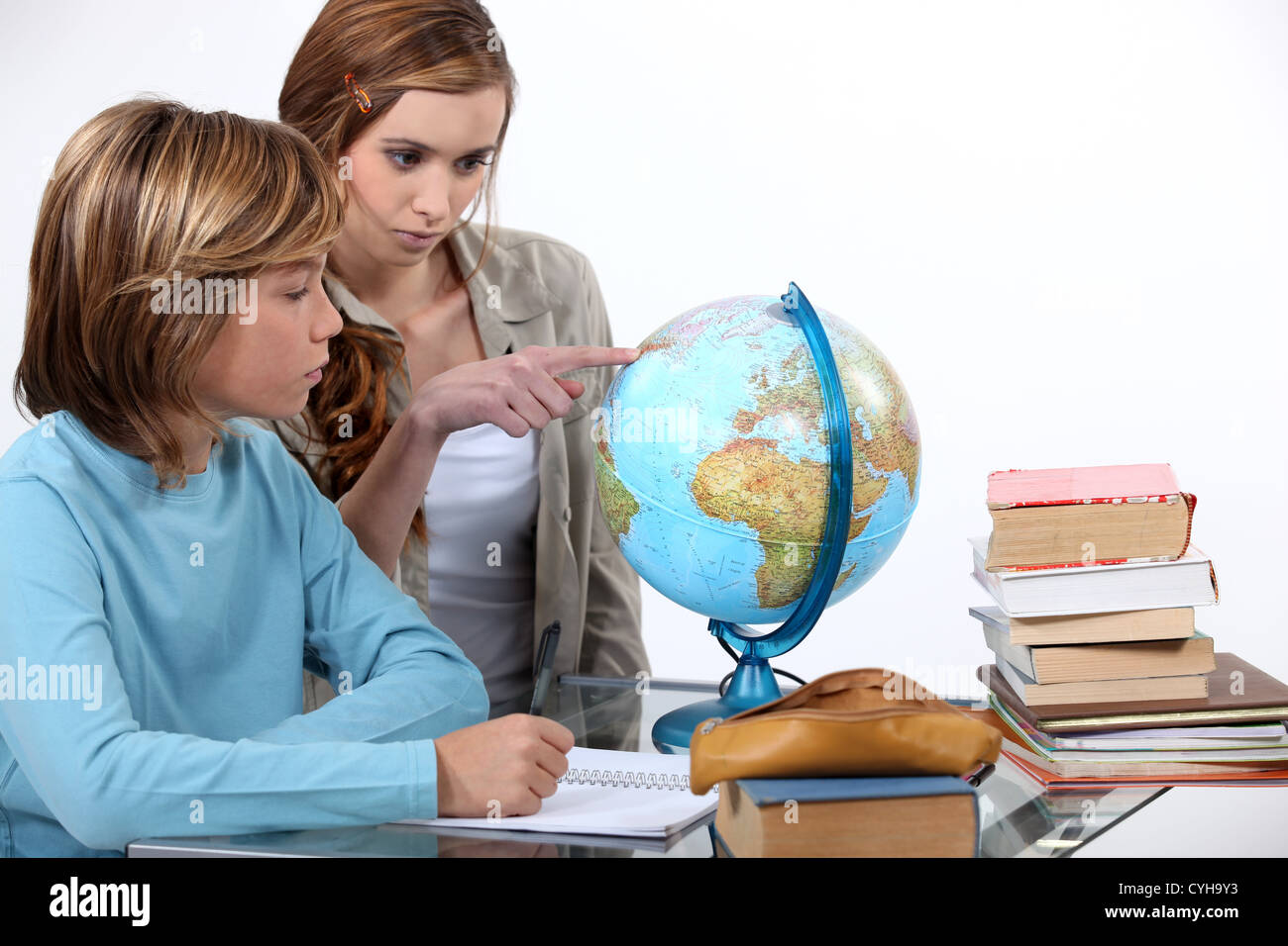 Two kids in geography class Stock Photo - Alamy