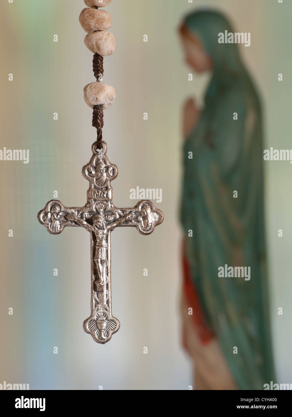 Cross with virgin Mary praying, closeup, for religious,spiritual themes ...