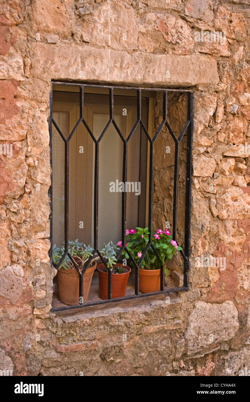 Window in stone wall, Siurana, Catalunya, Spain Stock Photo - Alamy