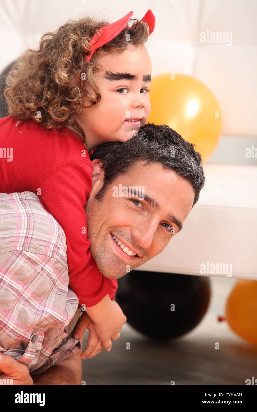Little kid dressed as devil Stock Photo - Alamy