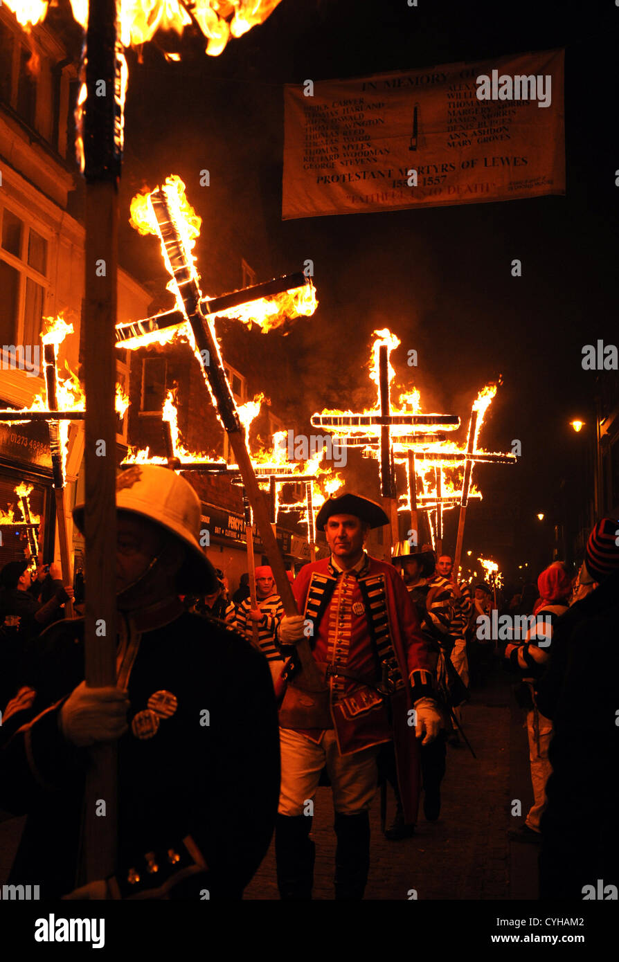 Members of Cliffe Society carry flaming crosses at the annual bonfire ...