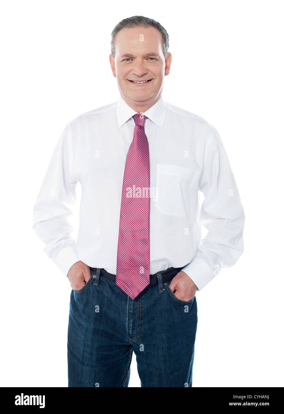 Smiling handsome senior businessman with hands in his pocket isolated ...