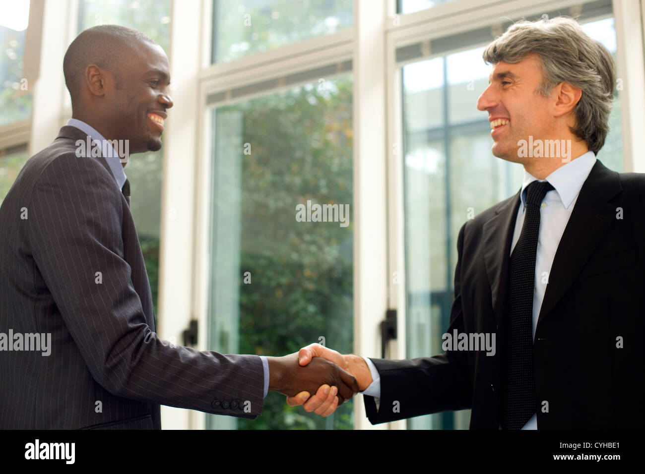 businessmen shaking hands Stock Photo - Alamy
