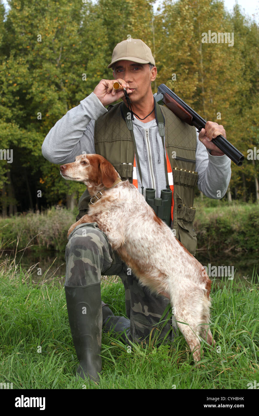 Hunter and his dog Stock Photo - Alamy