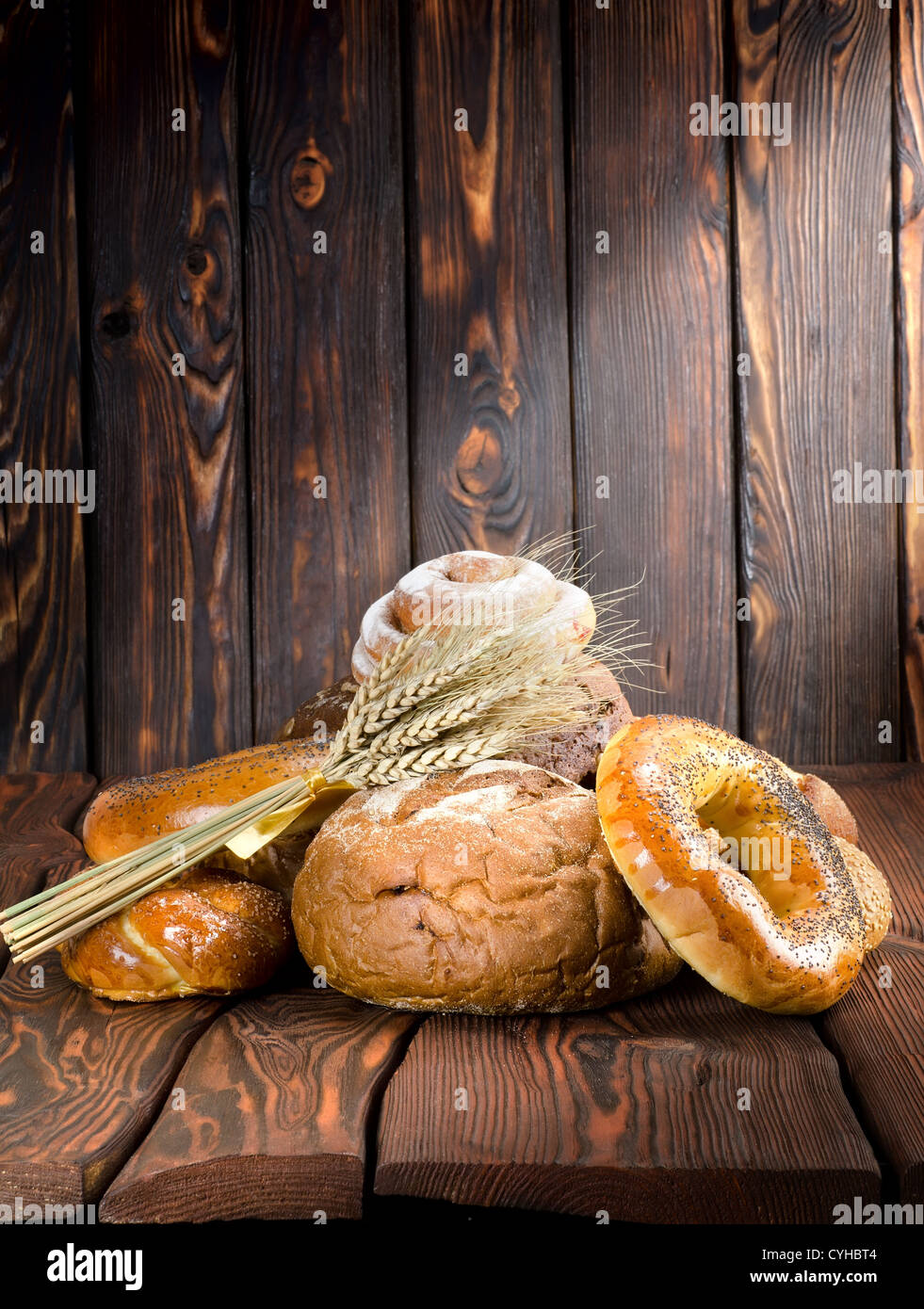 Bakery products on a wooden brown background Stock Photo - Alamy
