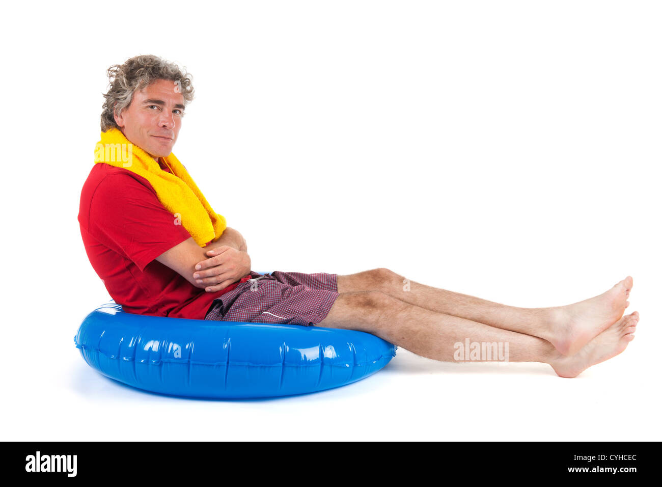 Adult man is sitting on a float Stock Photo - Alamy