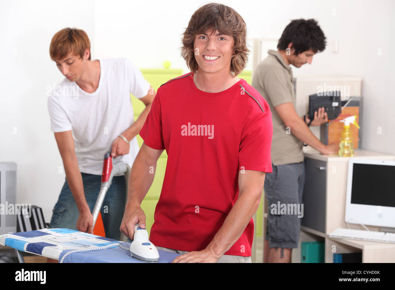 Boys cleaning the house Stock Photo - Alamy
