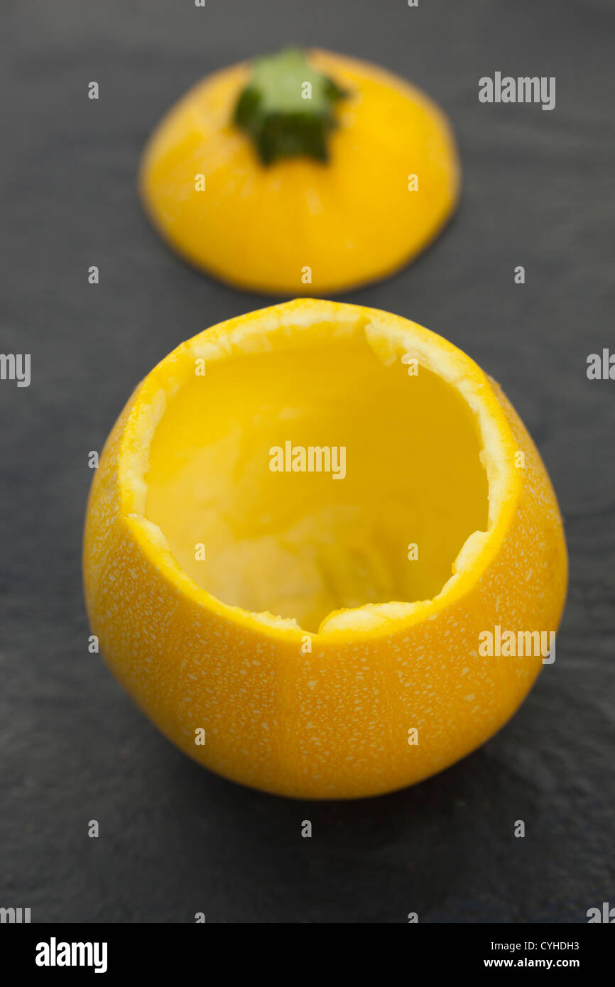 Round Yellow Courgette Hollowed out for Stuffing Stock Photo - Alamy