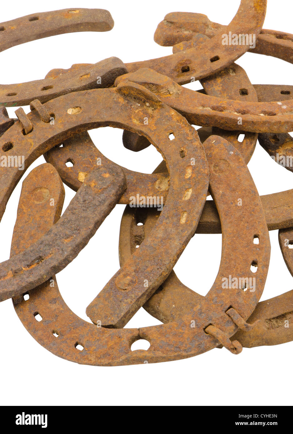 stack of old retro horse shoes isolated on white background Stock Photo ...