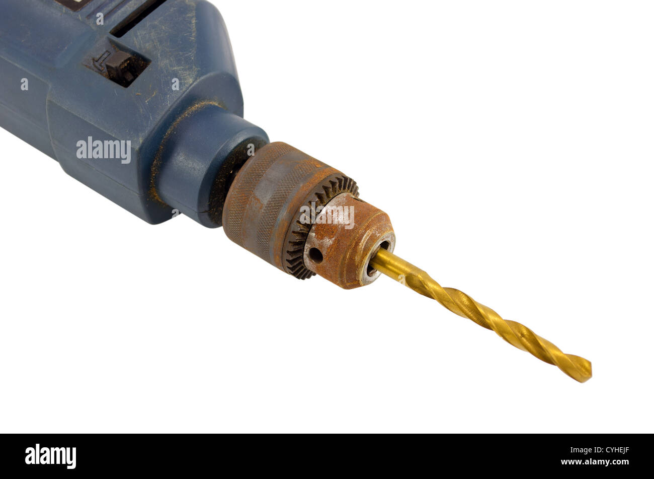 Rusty old electric drill with golden bit and rosette plug closeup ...