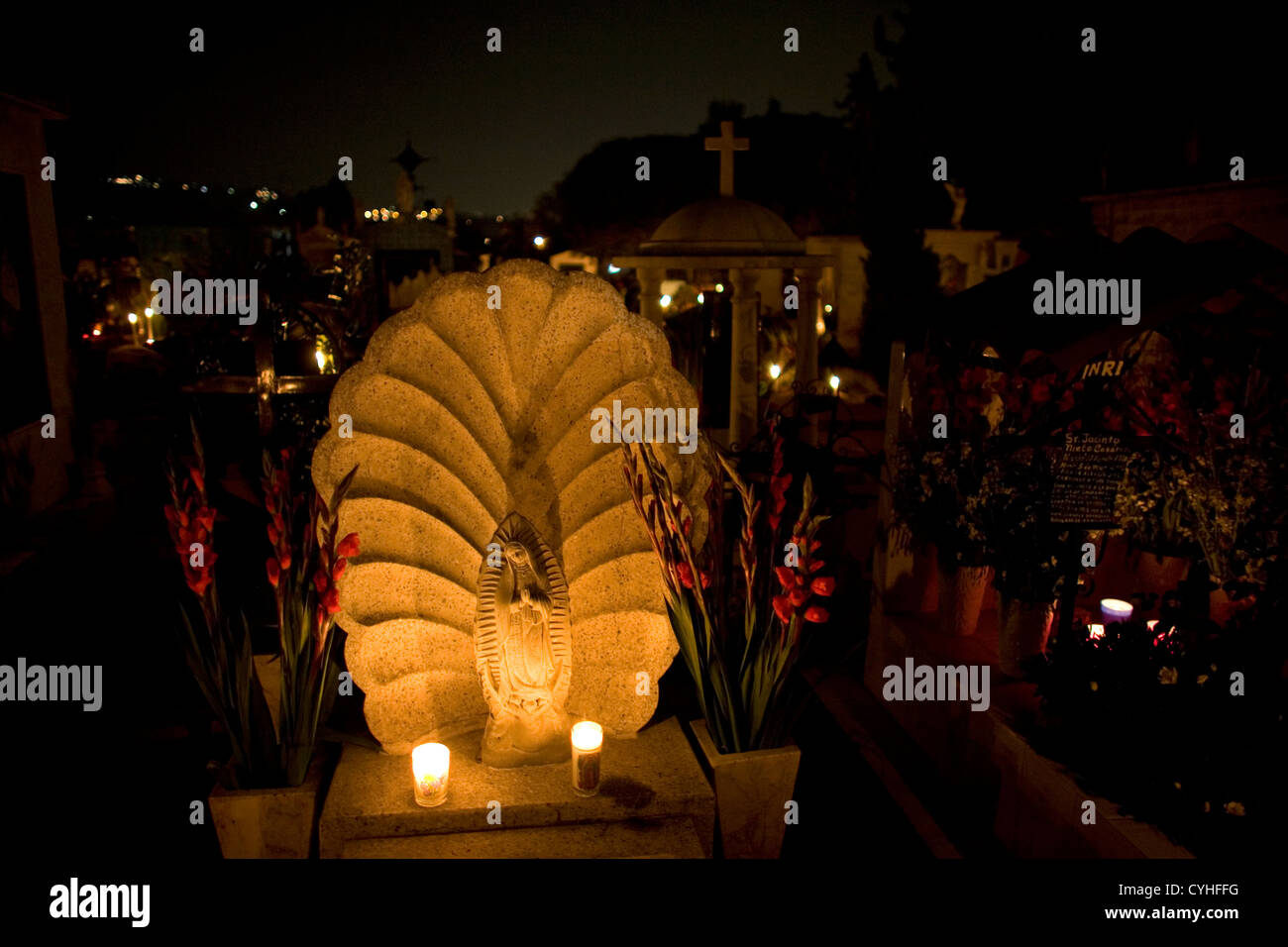An image of Our Lady of Guadalupe decorates a tomb in the cementery of ...