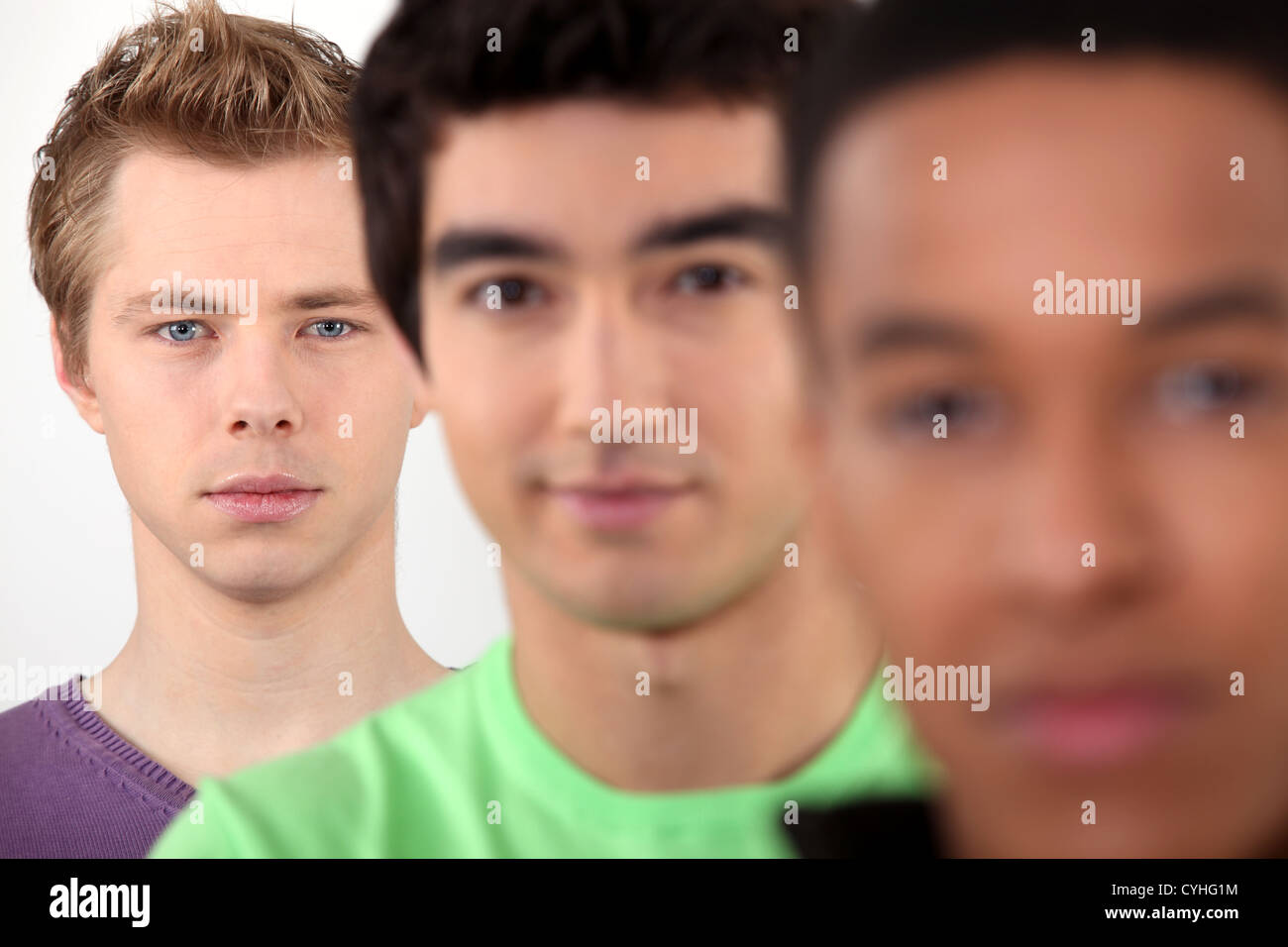 Three students in a row Stock Photo - Alamy