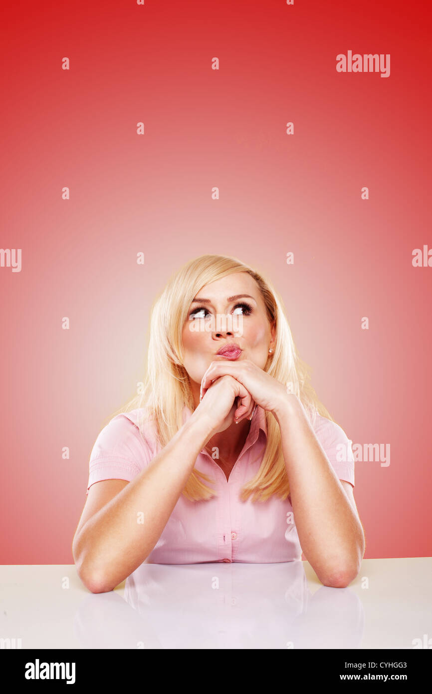Woman leaning against a counter hi-res stock photography and images - Alamy