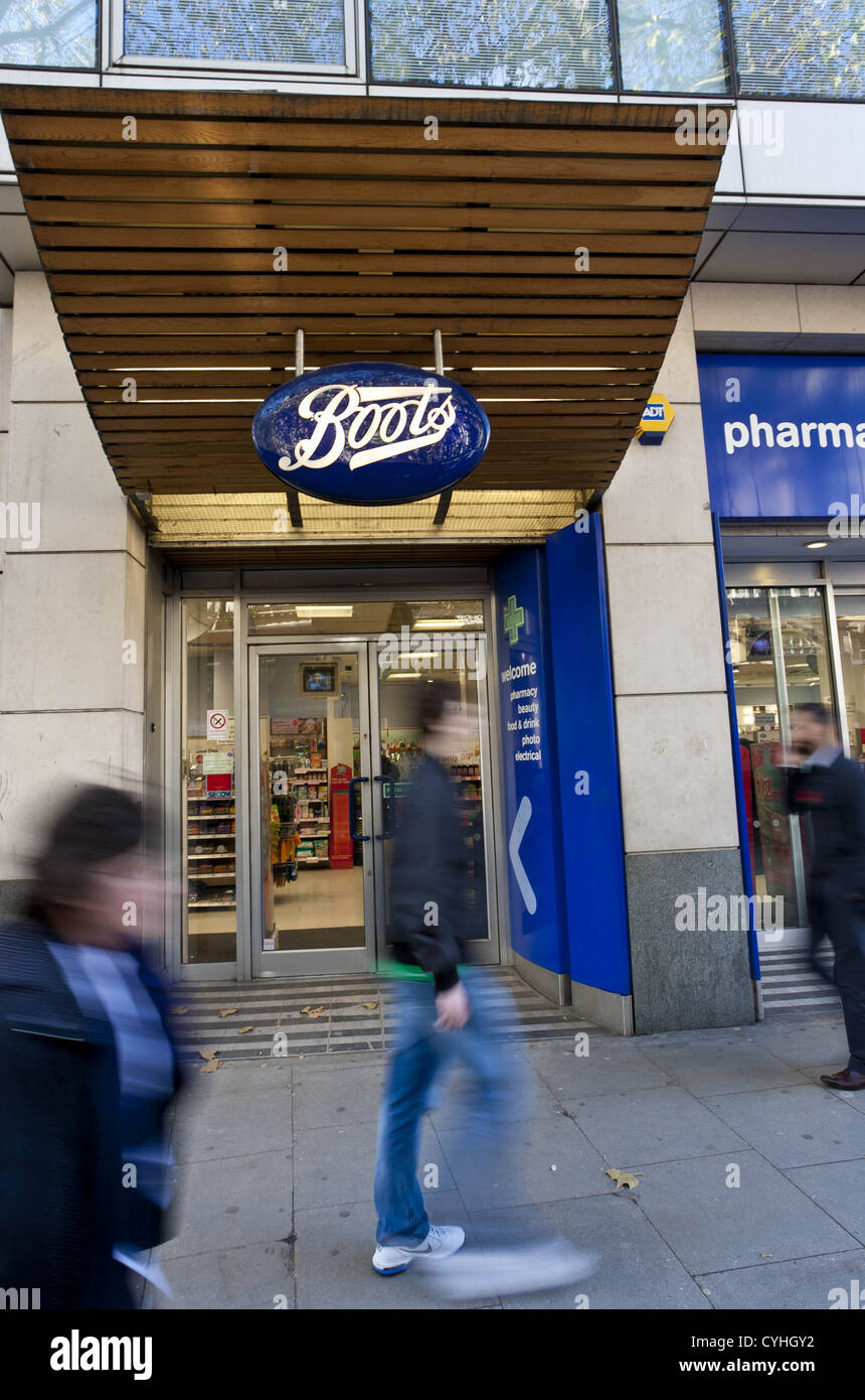 London, UK. 5/11/2012. (Pictured) People walking pass a Boots store ...