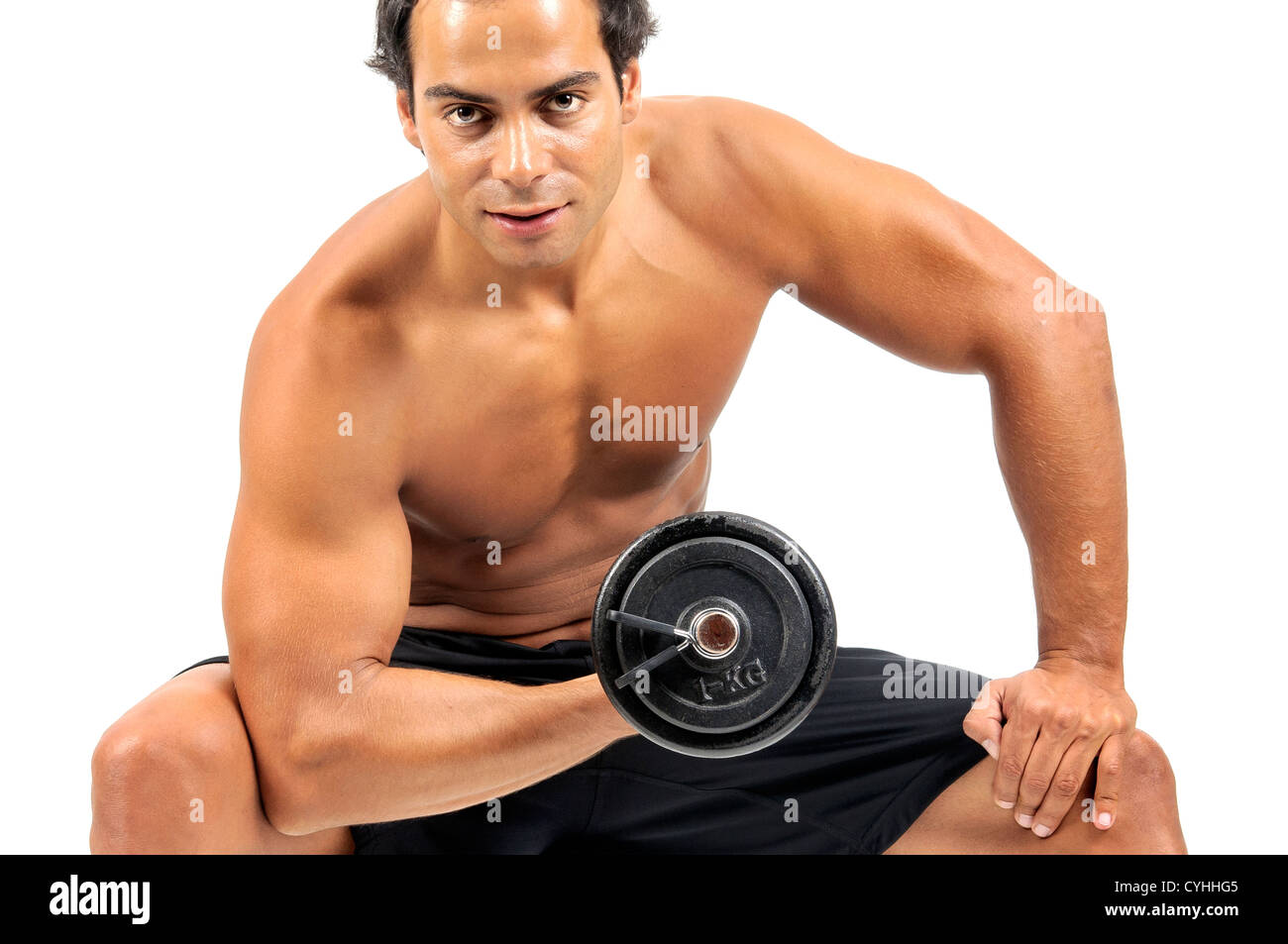 Young fitness man exercising with dumbbells isolated in white Stock ...