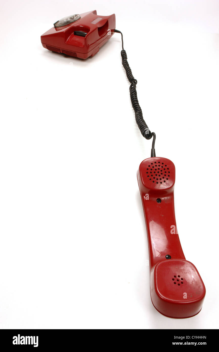 a red retro phone on white Stock Photo - Alamy