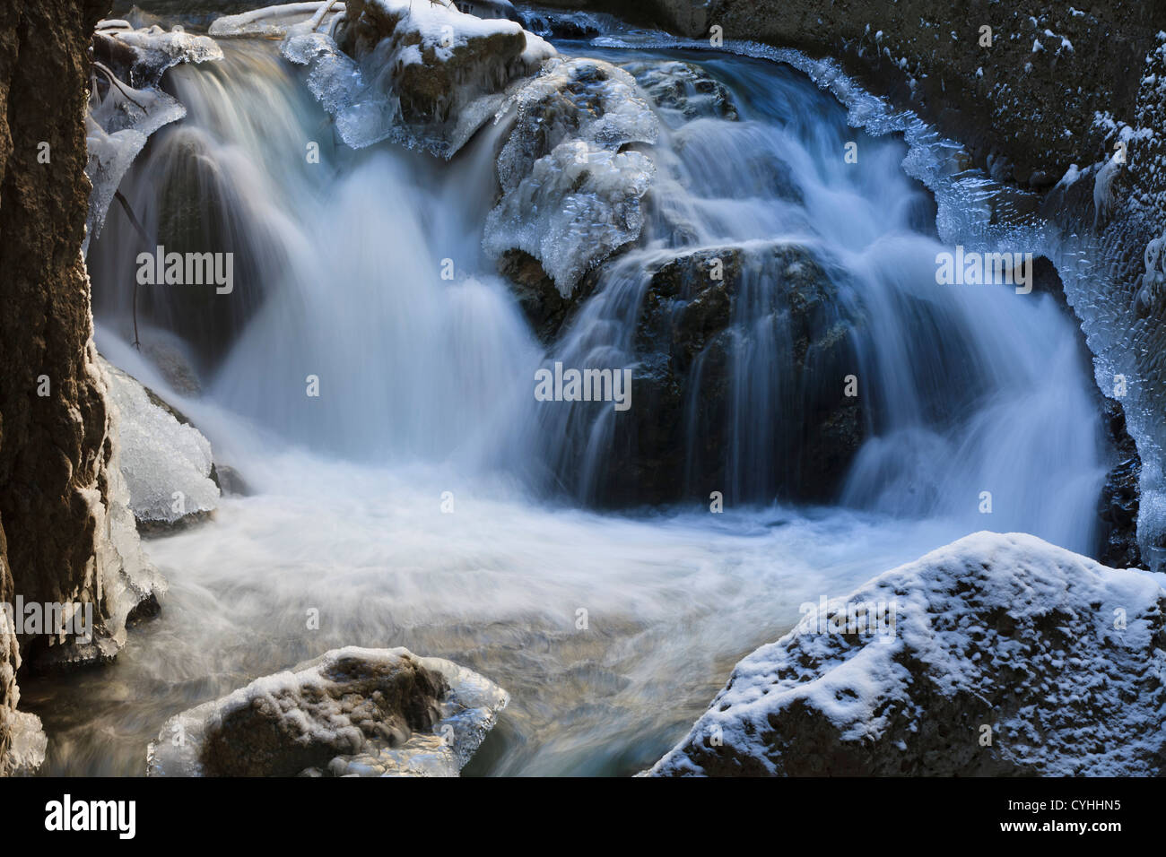 a small waterfall in winter Stock Photo - Alamy