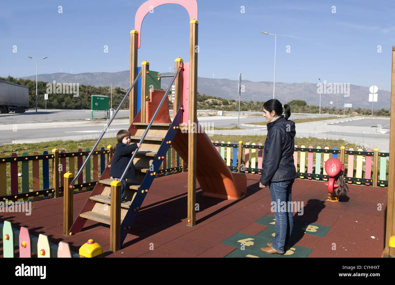 4 year old toddler playing on the playground Stock Photo - Alamy