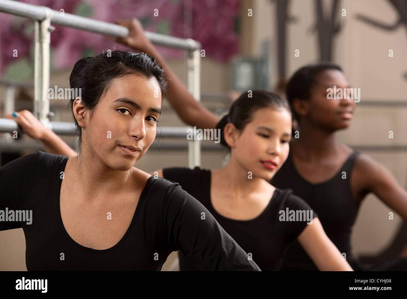 Happy young dancer with other students in ballet class Stock Photo - Alamy